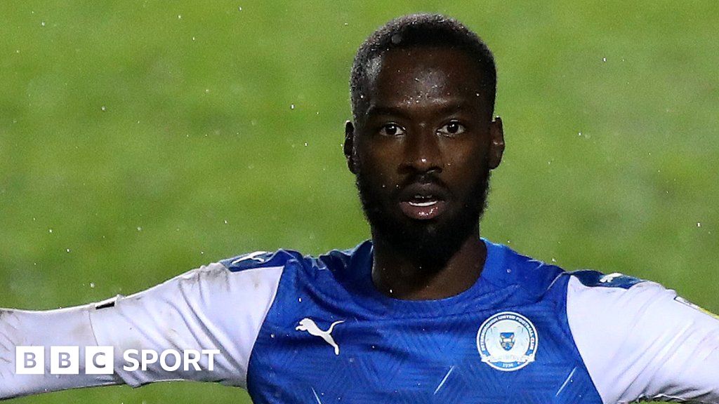 Mo Eisa: MK Dons sign Peterborough United striker - BBC Sport