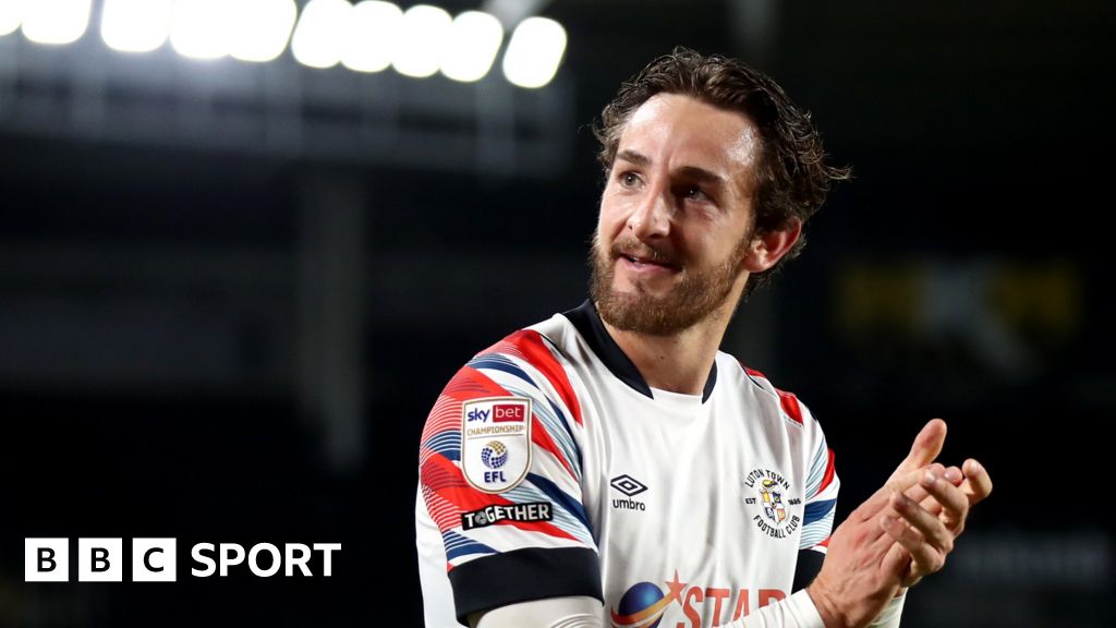 Tom Lockyer: Luton captain signs new deal and trains after operation ...