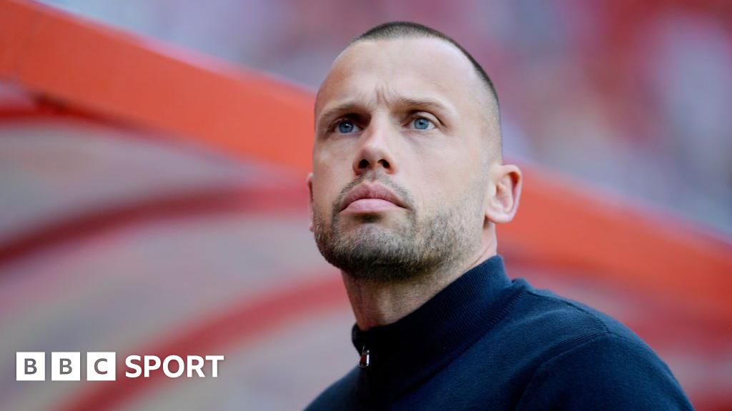Liverpool: Heitinga appointed Slot's assistant coach - BBC Sport