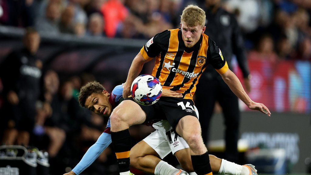 Andy Cannon: Wrexham sign midfielder from Championship side Hull - BBC ...