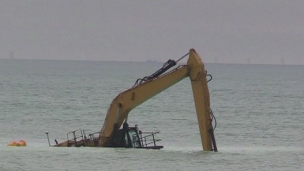 The digger stuck at sea! - BBC Newsround