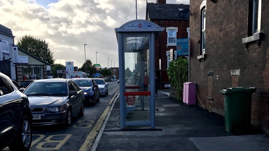 Bus stop built across Leeds cycle lane branded 'a joke' - BBC News