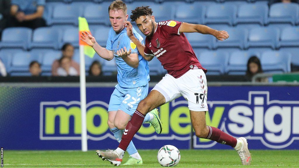 Stevenage: Coventry City's Josh Reid and Reading's Jokull Andresson ...