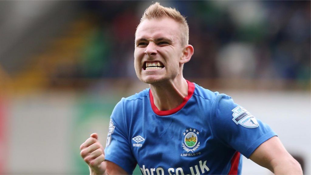 Linfield go top after Andrew Mitchell penalty earns win over Ballymena ...