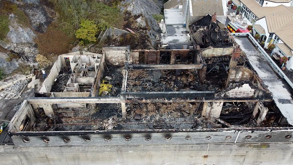 Mumbles Pier: Extent of fire damage seen from above - BBC News