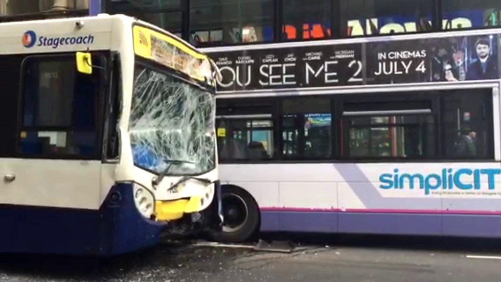 Driver suspended after 'runaway' bus crash in Glasgow - BBC News