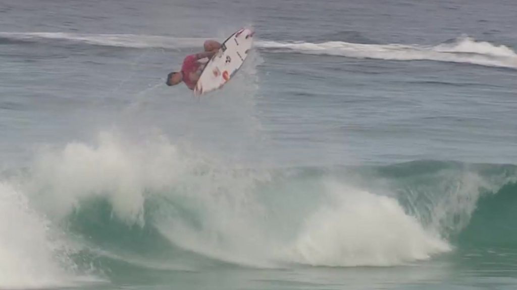 Watch this surfer perform an epic backflip over a wave - BBC Newsround