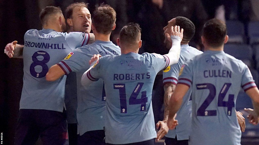 Millwall 1-1 Burnley: Clarets extend lead at top to 12 points despite ...
