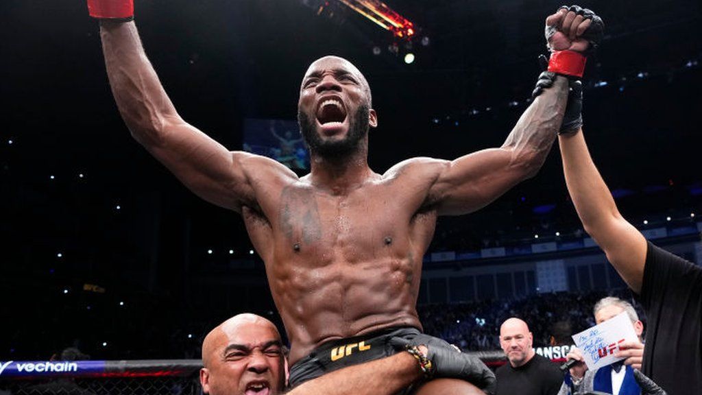 Leon Edwards: UFC champion up for WWE match after merger - BBC News