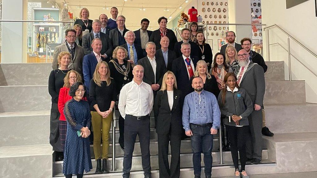 First two Afghan families move into Exeter council homes - BBC News