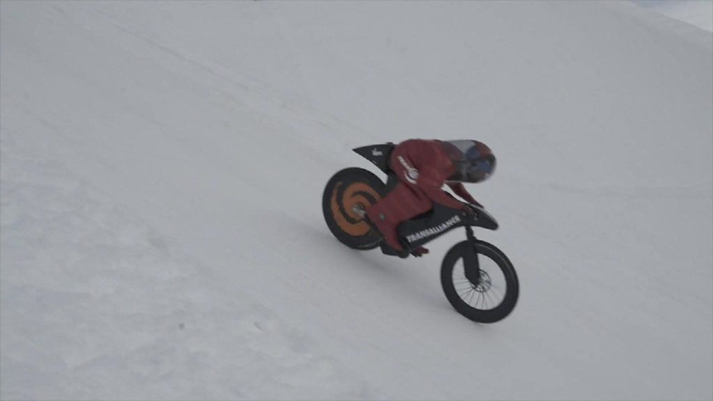 A man has set a new record speed riding a mountain bike on snow - BBC ...