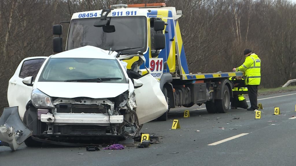 Motorway reopens after lorry overturns - BBC News