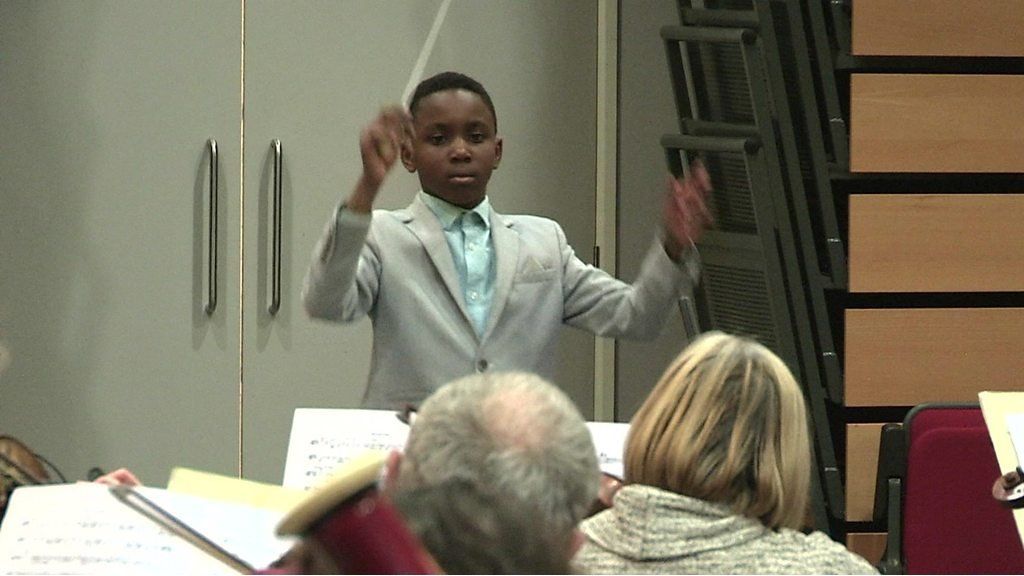 Young conductor on music mission - BBC Newsround