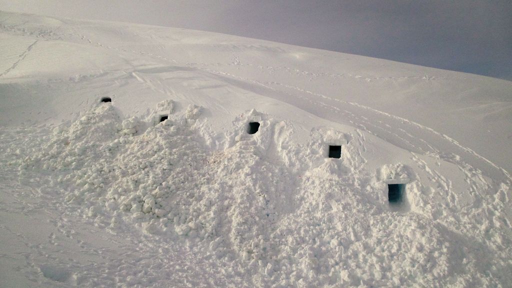 Take a peek inside military snow holes on Scottish Munro - BBC News