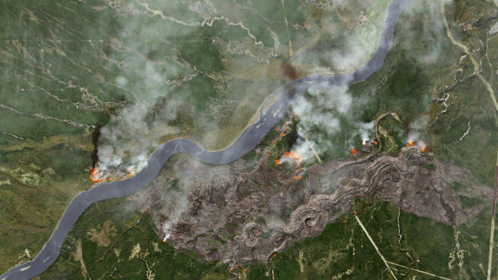 Nasa releases satellite pics of Fort McMurray wildfire - BBC Newsround