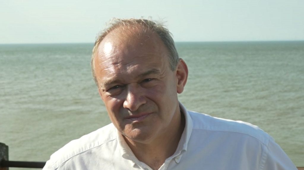 Sir Ed Davey splashes in Sheringham for election campaign - BBC News