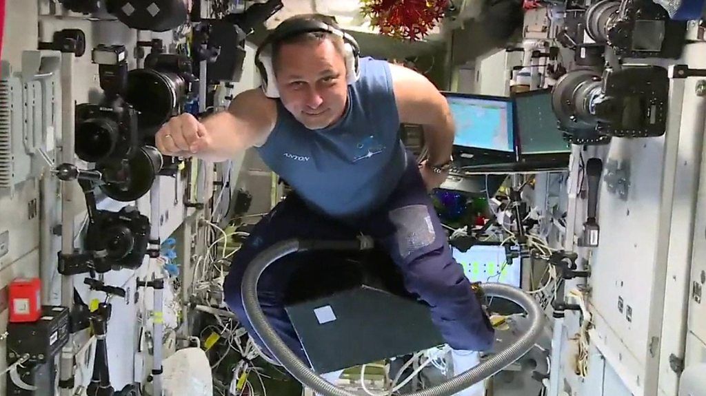 Cosmonaut flies vacuum cleaner in International Space Station - BBC ...
