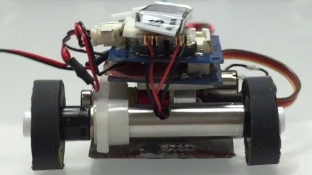 Tiny super-strong robots work together to move a car - BBC Newsround