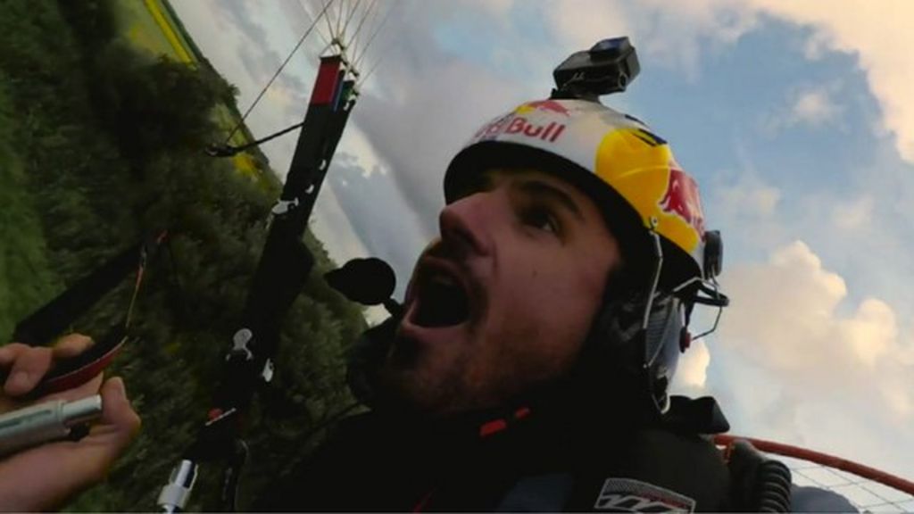 Paraglider flies with thousands of birds - BBC Newsround
