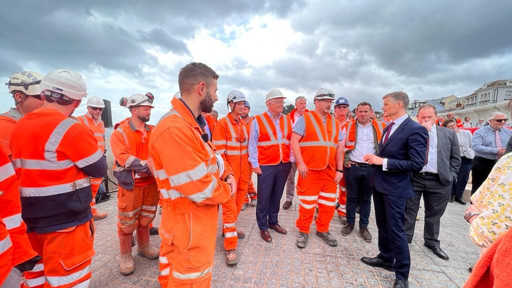 Minister opens Devon station and marks completion of sea defences - BBC ...