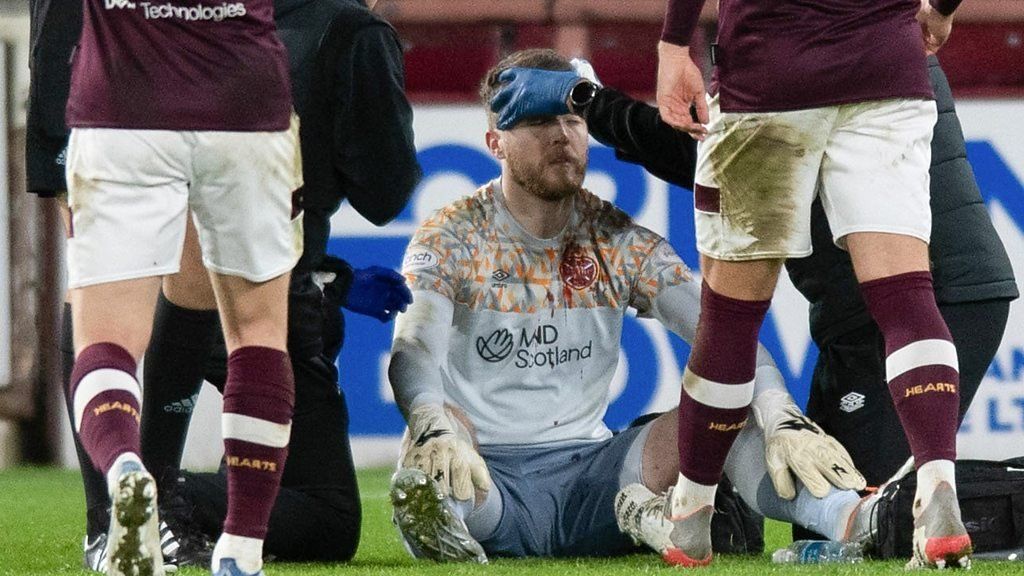 Clark has 'blood pouring from head' after object thrown - BBC Sport