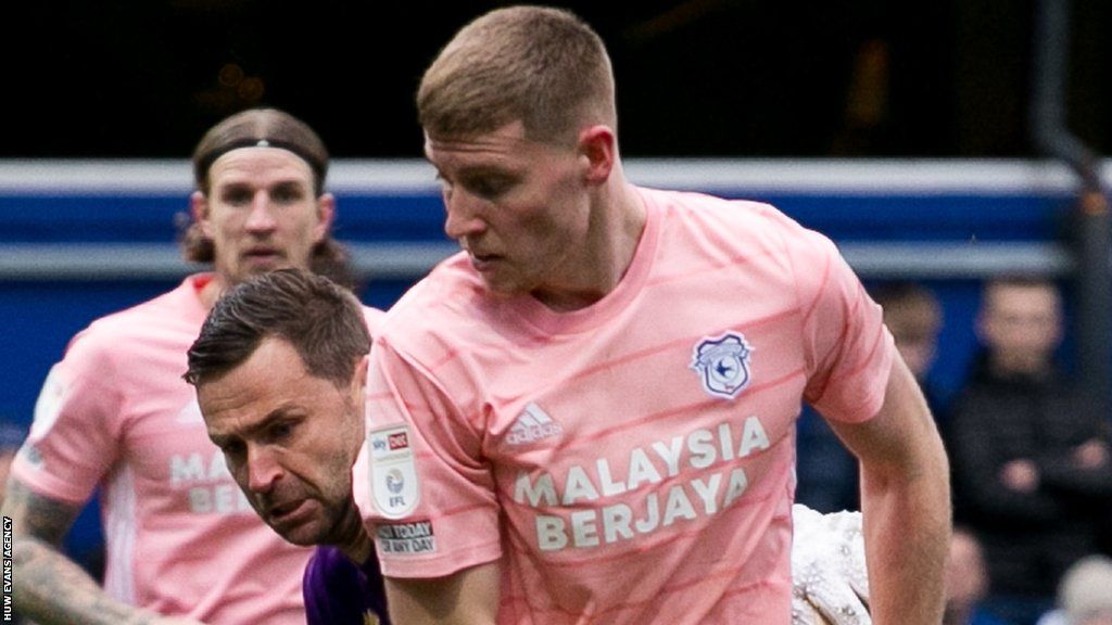 Cardiff City recall defender Mark McGuinness from Owls loan - BBC Sport