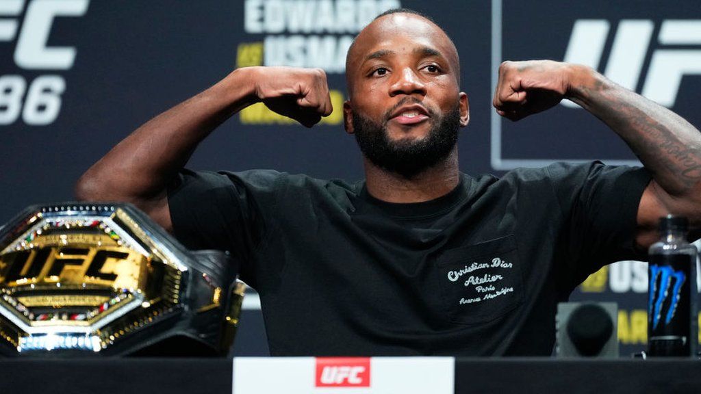 Leon Edwards: UFC champion up for WWE match after merger - BBC News