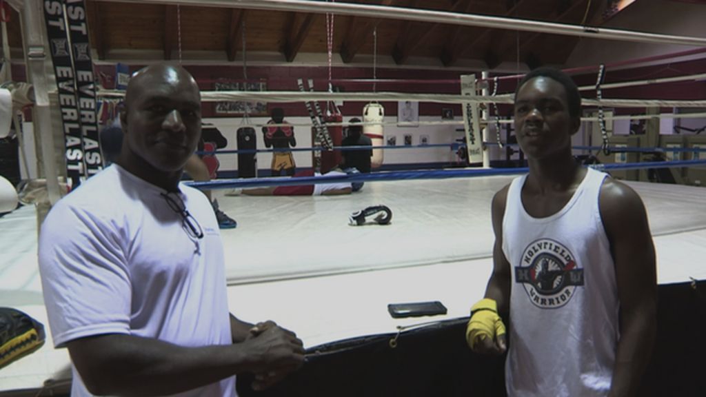 Evander Holyfield gives son Evan boxing advice - BBC Sport