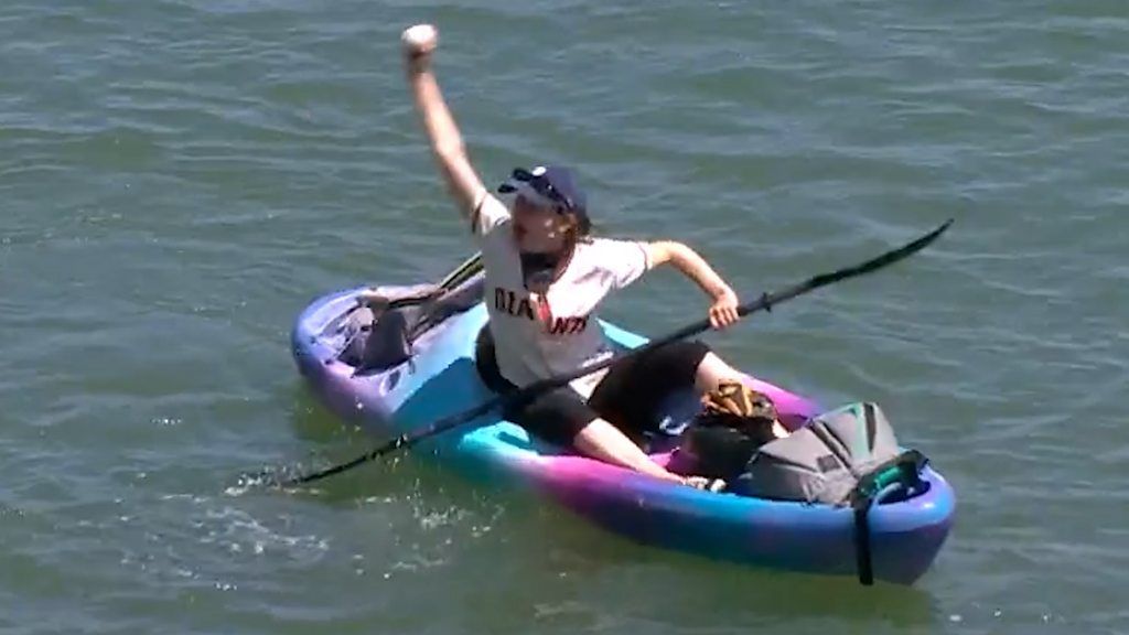 MLB: Making a splash! - MLB fan fetches home run ball in Kayak - BBC Sport