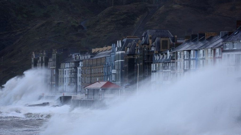 In pictures: Storm Eunice's sea surges, fallen trees, flying sheds ...