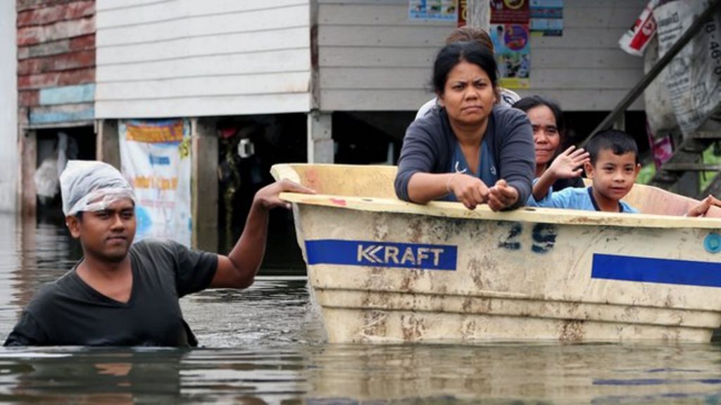 Record rainfall triggers floods across southern Thailand - BBC Newsround