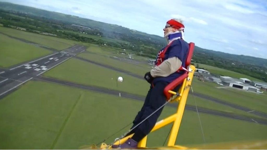 Norma Howard, 91, becomes 'oldest UK woman to wing-walk' - BBC News