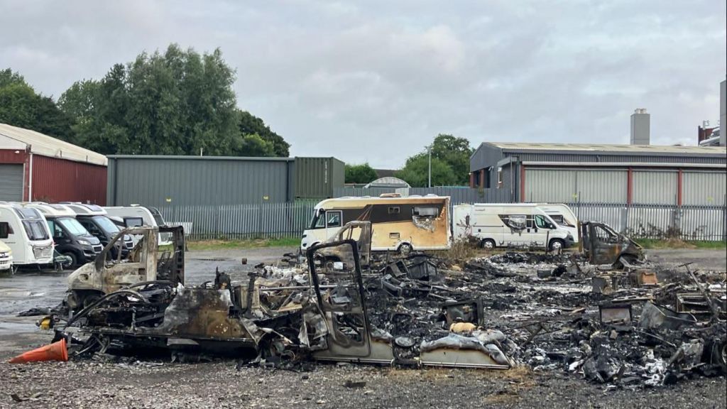 Fire at caravan storage yard in Chadderton - BBC News