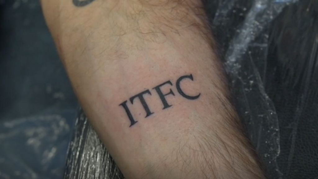 More Ipswich fans getting club tattoos to 'show love for team' - BBC News