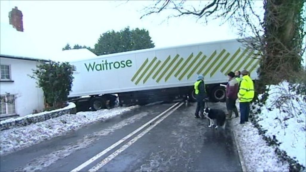Waitrose lorry crashes into farmhouse in Devon - BBC News
