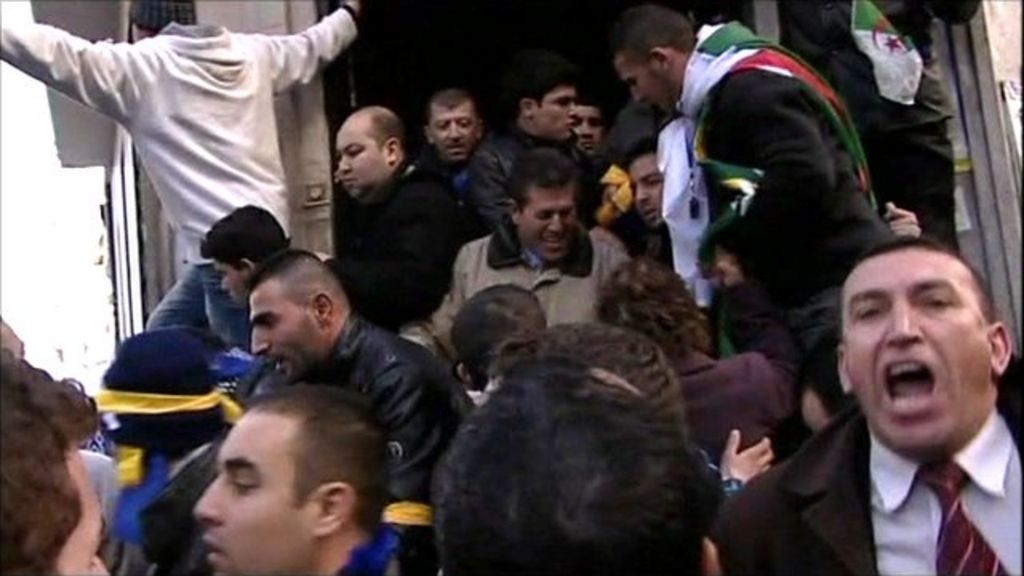 Police break up protest in Algerian capital - BBC News
