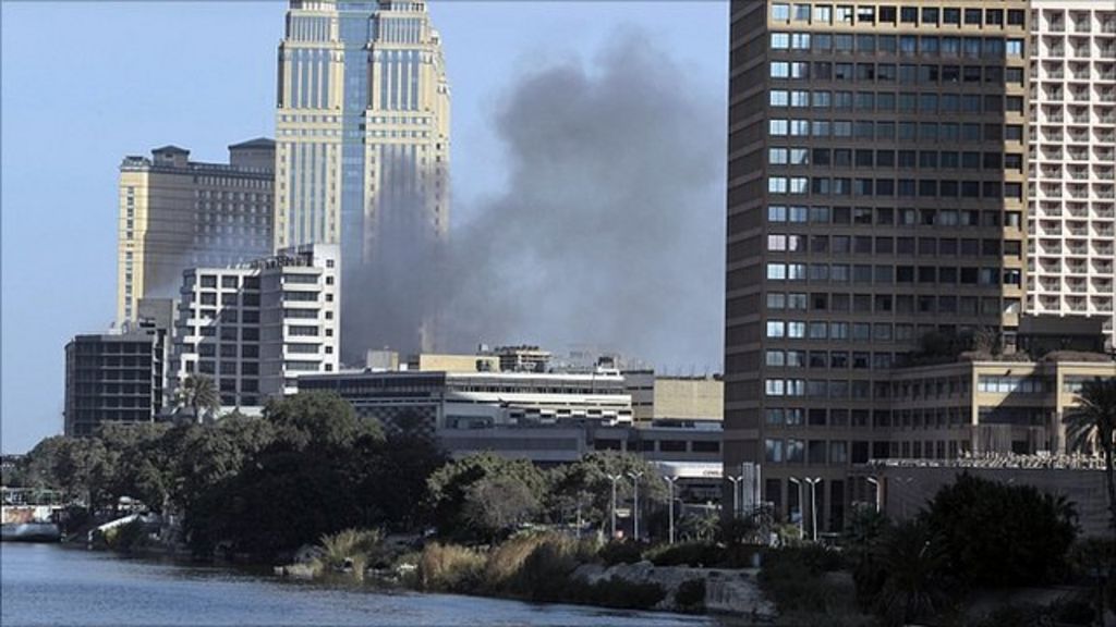 Cairo eyewitness: 'We've heard gunshots' - BBC News