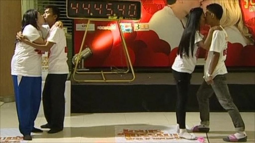 Couple set record for the longest kiss in history - BBC News