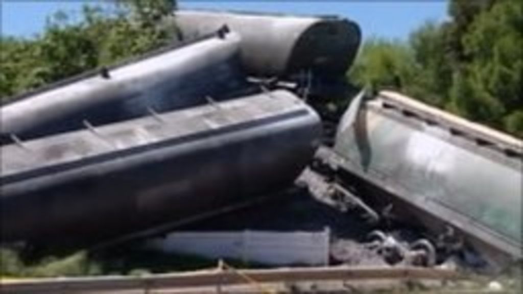 Runaway train rolls onto road in Australia - BBC News