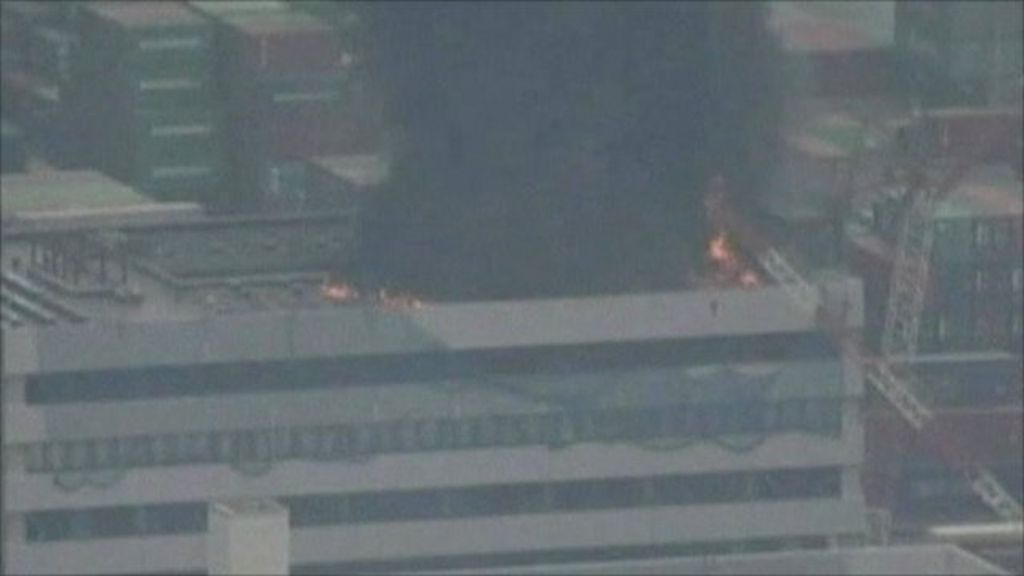 Japan earthquake: Tokyo building's roof on fire - BBC News