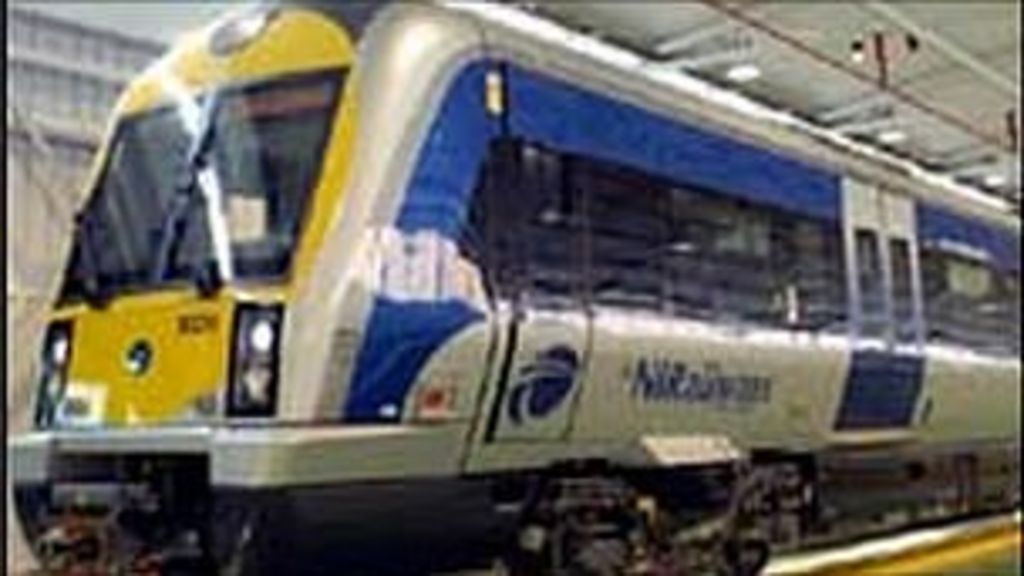 First of 20 new trains arrives at Belfast docks - BBC News