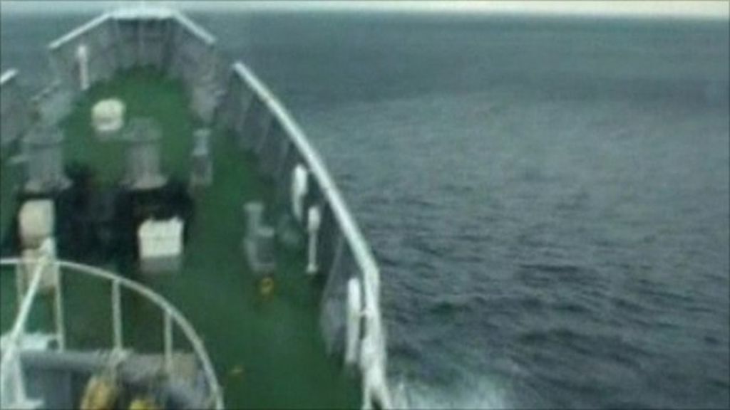 New footage: Japan tsunami strikes at sea - BBC News