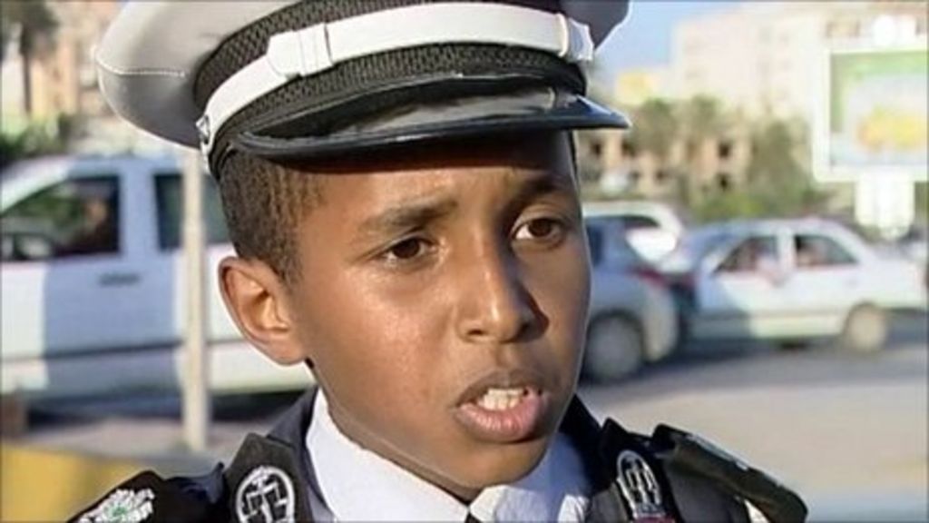 Libya's child traffic cops - BBC News