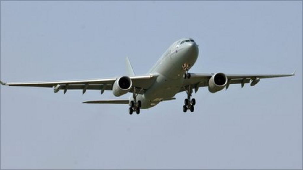 Voyager, biggest plane in RAF history, arrives in UK - BBC News