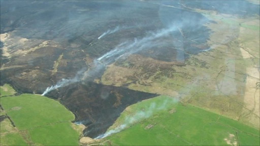 Wildfires still burning in Scotland, NI and North West - BBC News