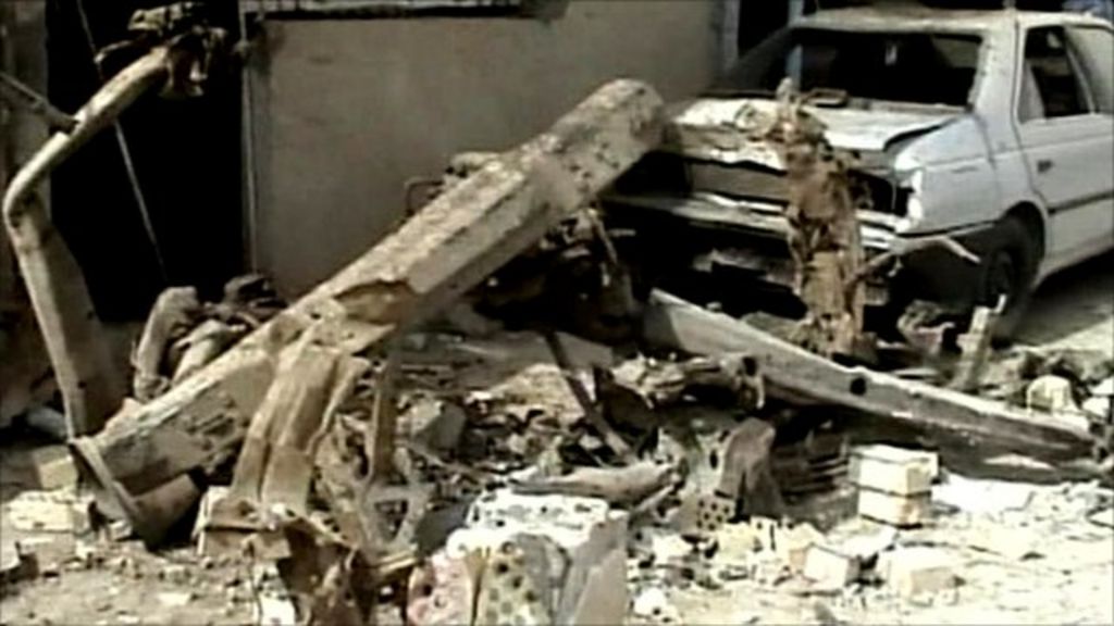 Suicide car bomb attack at police station kills and wounds dozens in ...