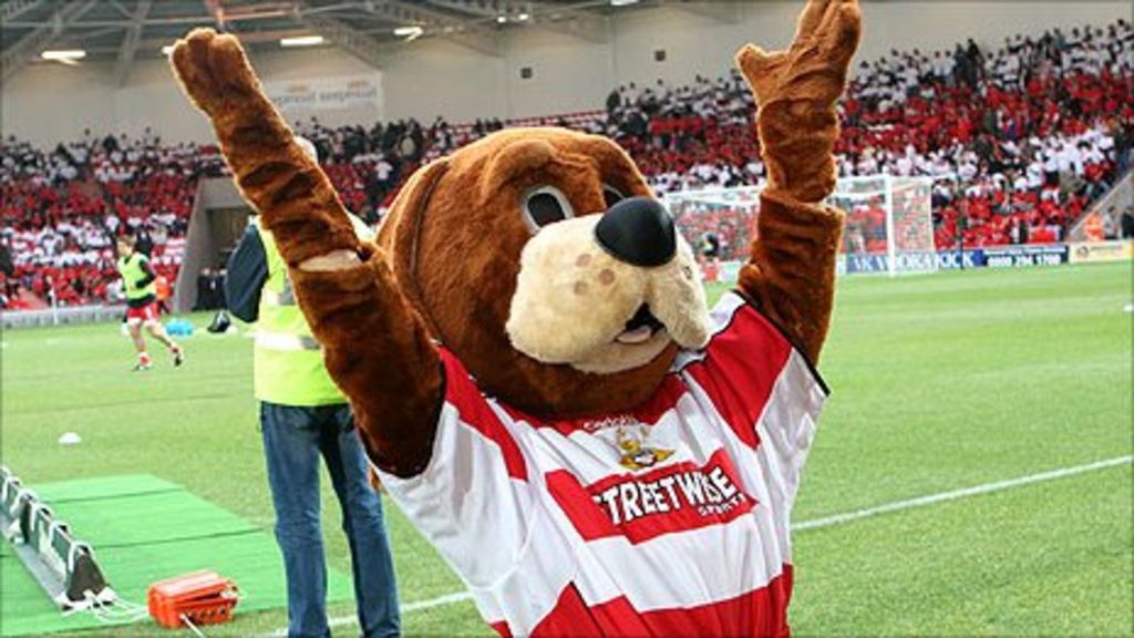 Doncaster Rovers' Donny Dog underwear pose mascot reinstated - BBC News