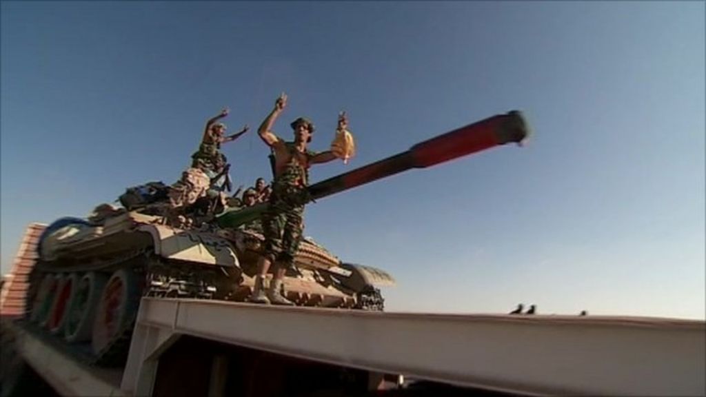 Libya: Rebels advance on Gaddafi's hometown - BBC News