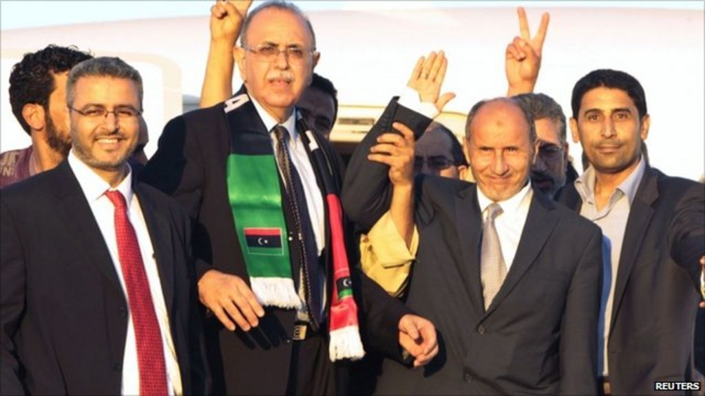 Libya unrest: NTC leader arrives in Tripoli - BBC News