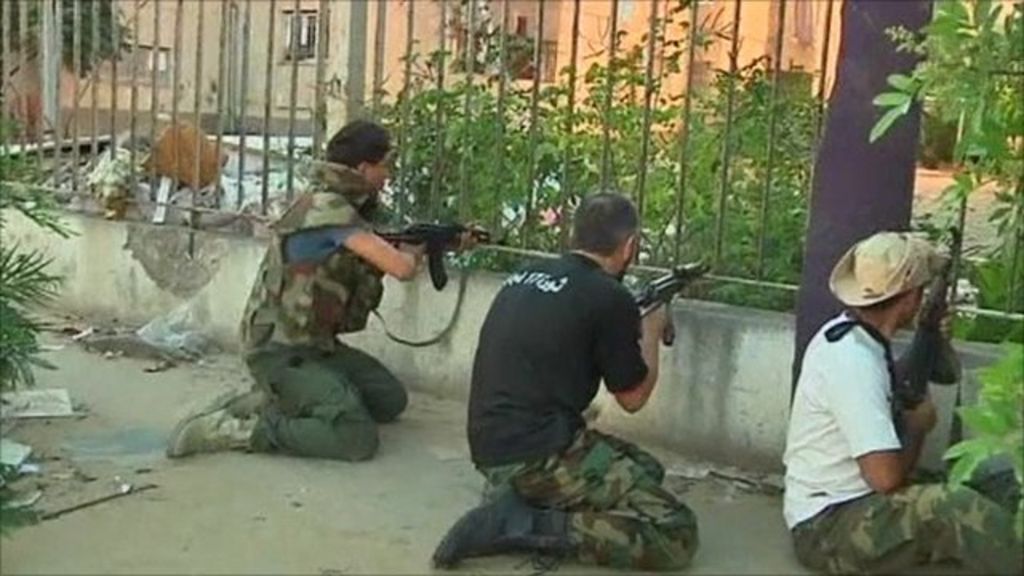 'Gaddafi loyalists' and Libya NTC Tripoli battle ends - BBC News
